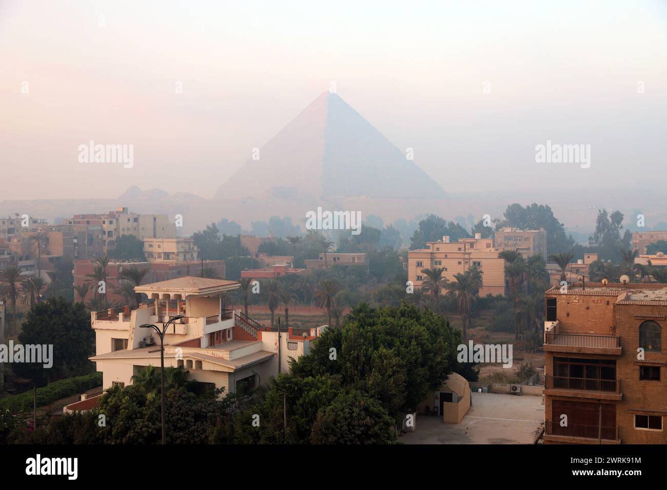 A fantastic foggy morning in Cairo. In the background is the Great ...
