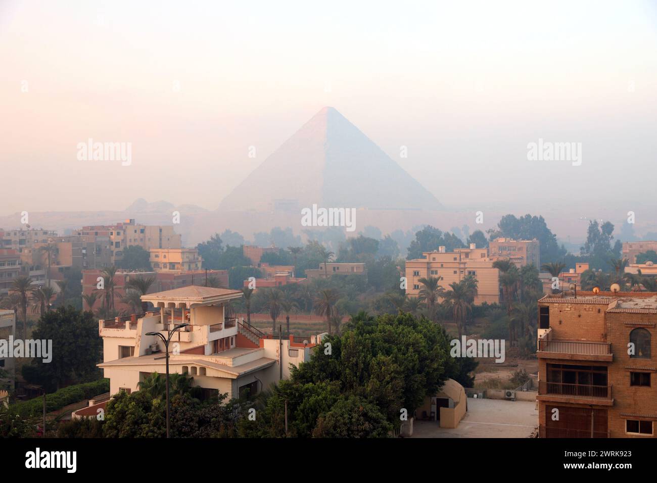 A fantastic foggy morning in Cairo. In the background is the Great ...