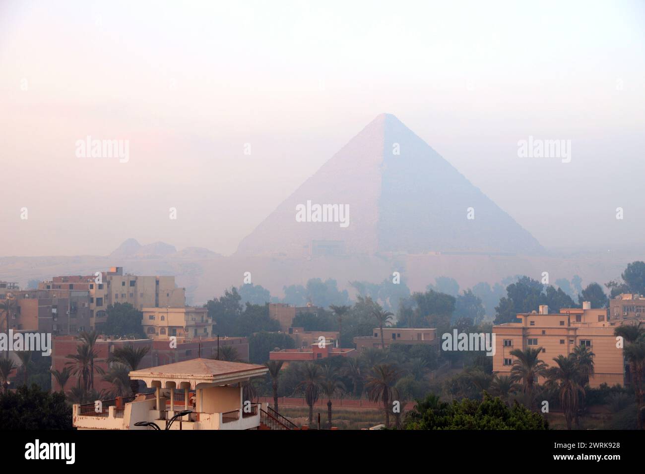 A fantastic foggy morning in Cairo. In the background is the Great ...