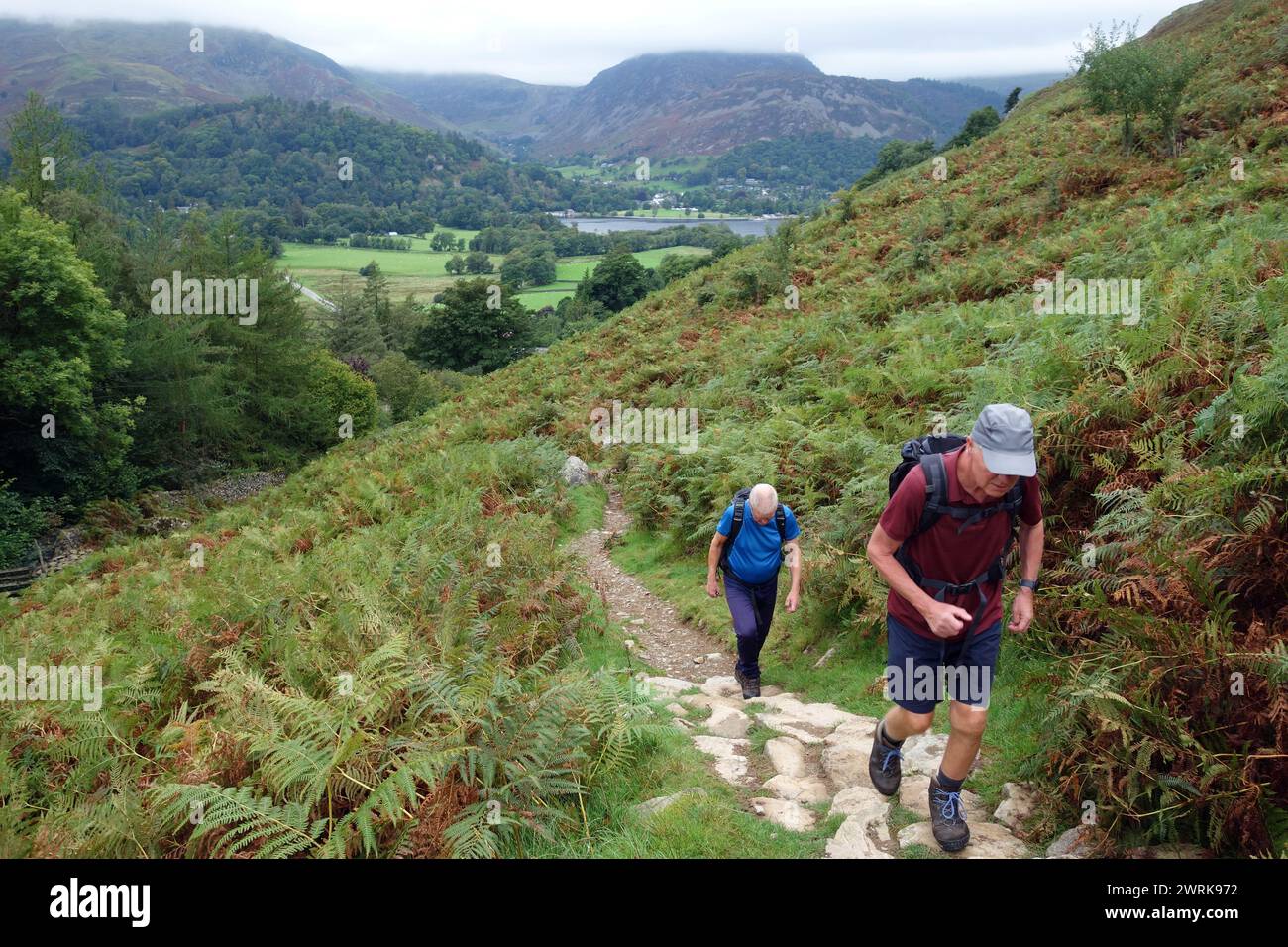 Two Men (Hikers) Walking on Path to Boredale Hause to the Wainwright ...