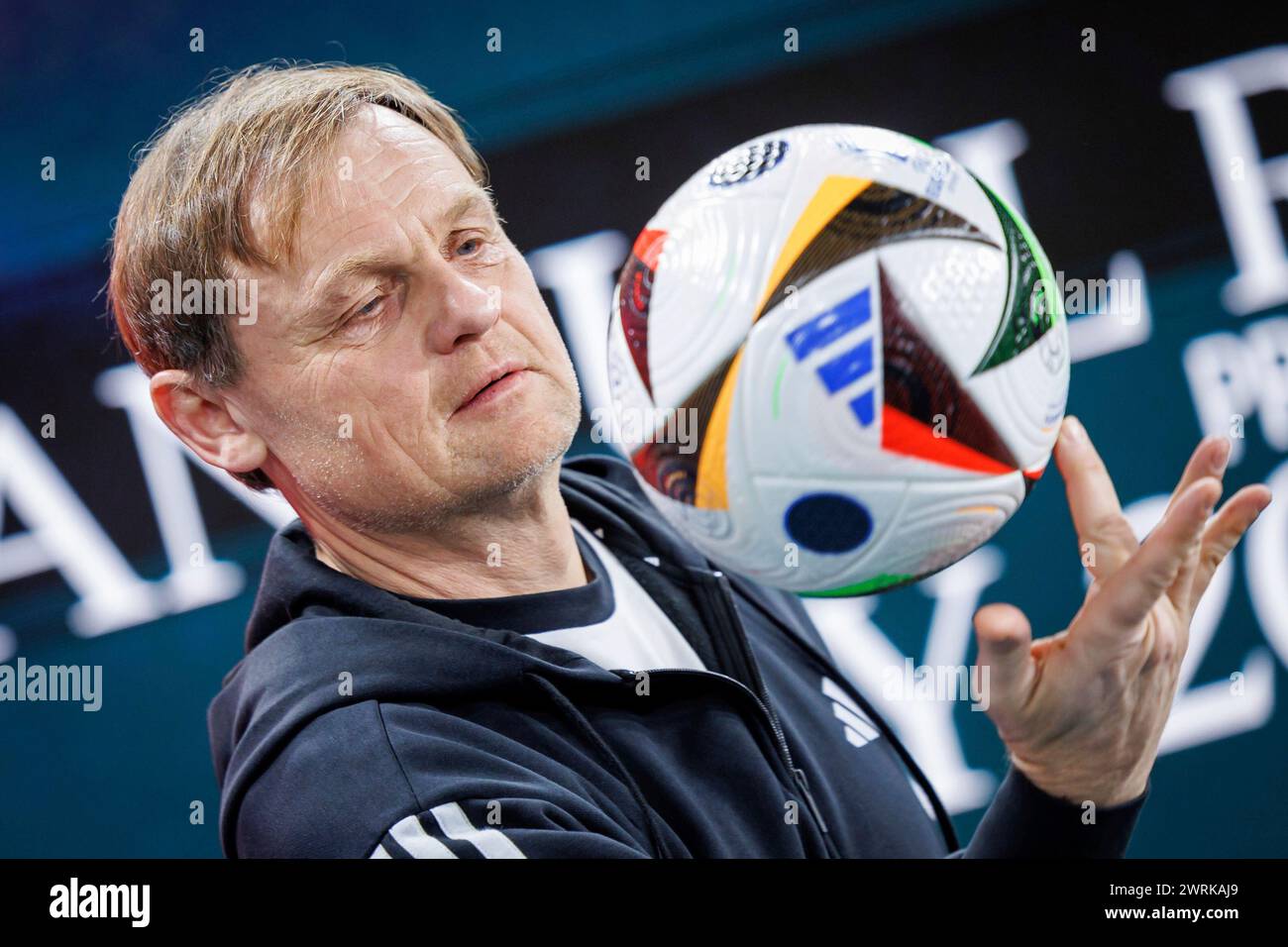Adidas CEO Bjørn Gulden holds the official match ball of the EURO 2024 ...