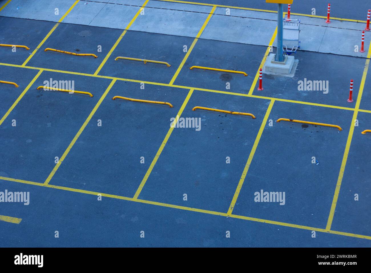 Empty parking lots in a car park. Yellow lines of parking lots Stock ...