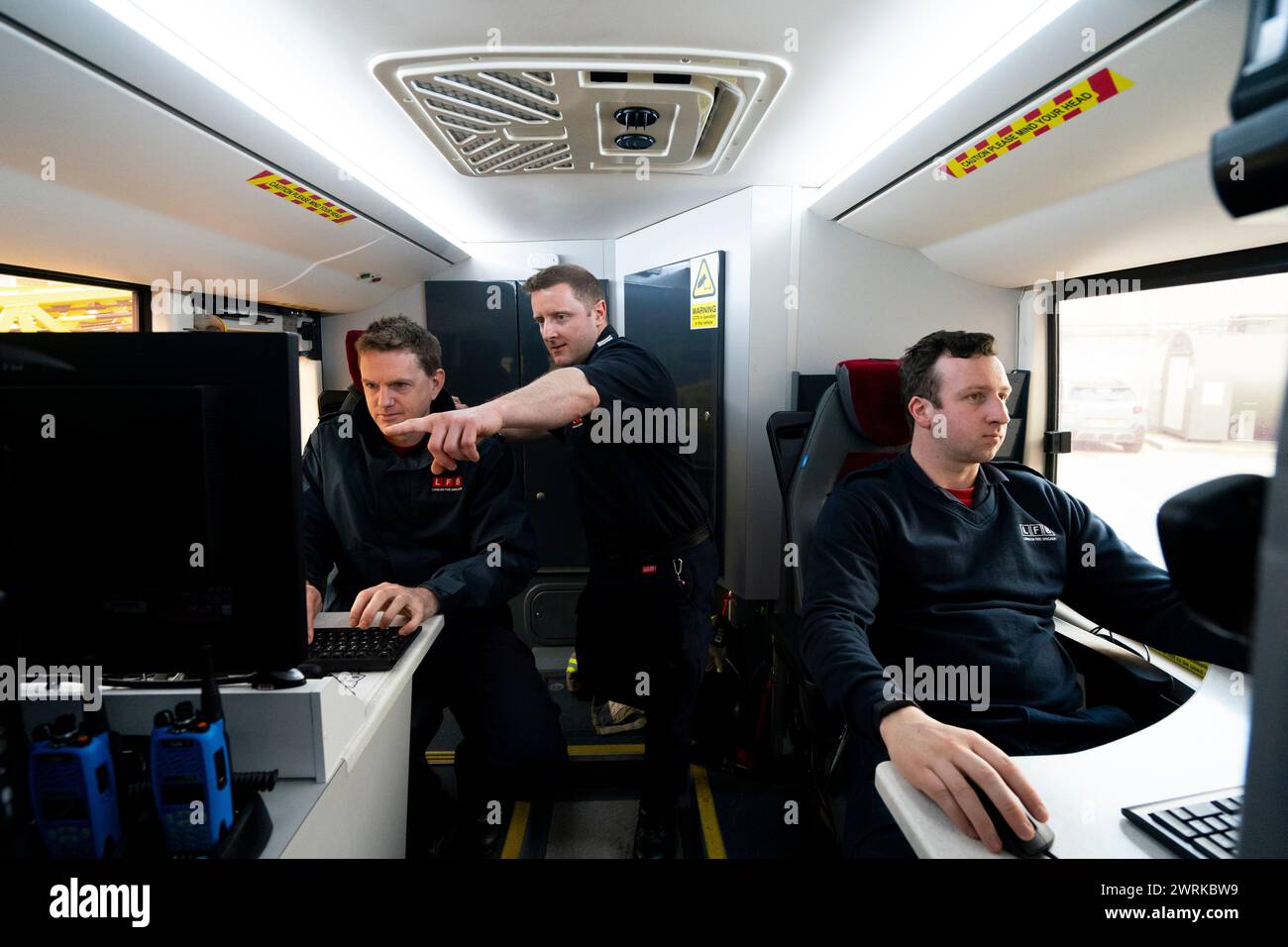 London Fire Brigade firefighters operate new technology inside the ...
