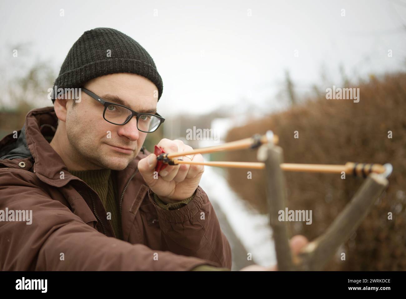 Slingshot man hi-res stock photography and images - Alamy