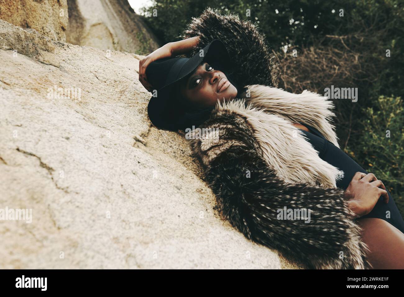 Rocks, fashion and portrait of black woman in forest with style, trendy ...