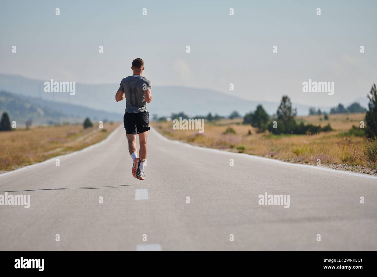 A dedicated marathon runner pushes himself to the limit in training ...