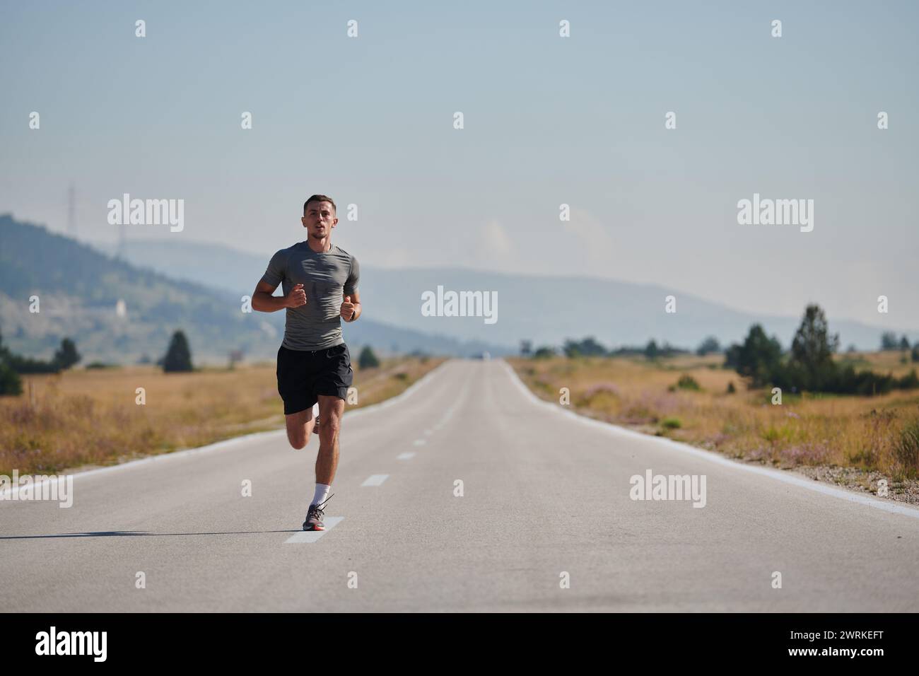 A dedicated marathon runner pushes himself to the limit in training ...