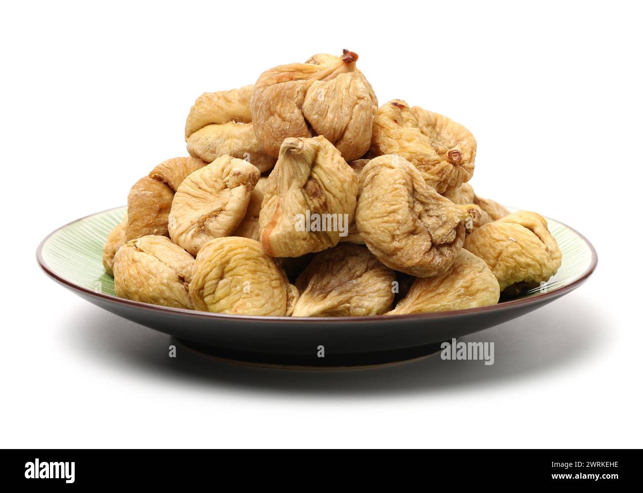 dried fig on white background Stock Photo - Alamy