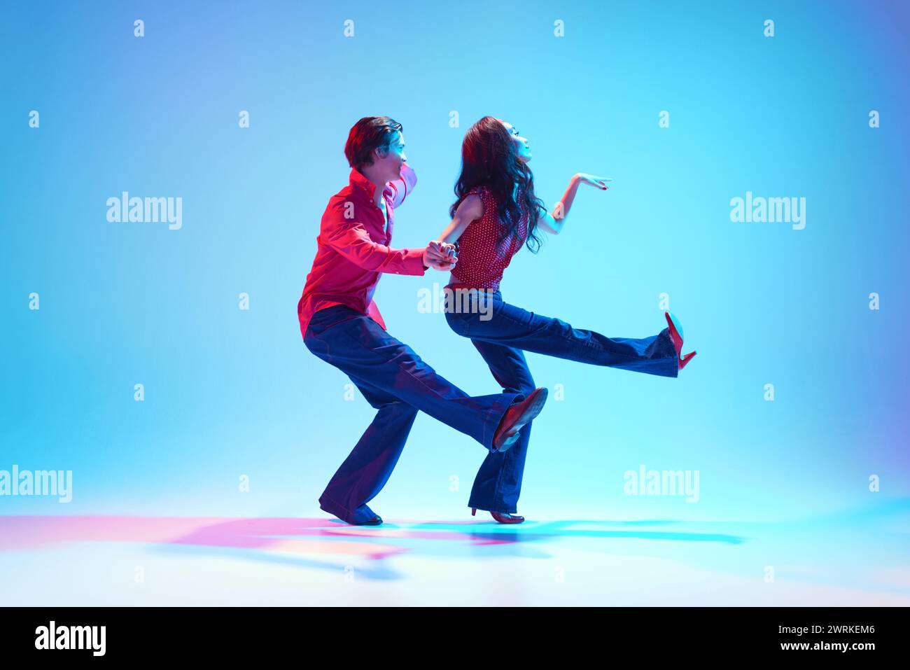 Rockability era. Retro dance aesthetics. Young stylish man and woman ...