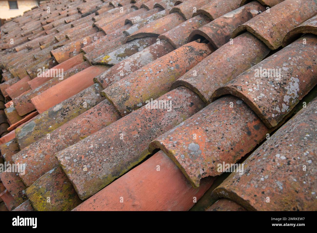 tiled roof supported on a double pitch roof, the old tiles tend to slip ...