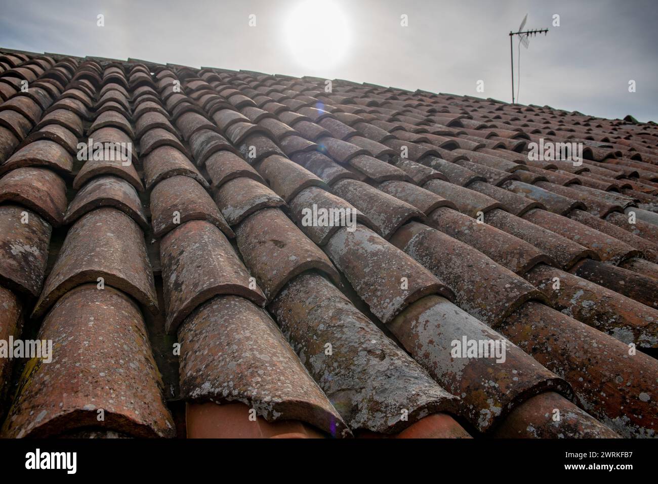 tiled roof supported on a double pitch roof, the old tiles tend to slip ...
