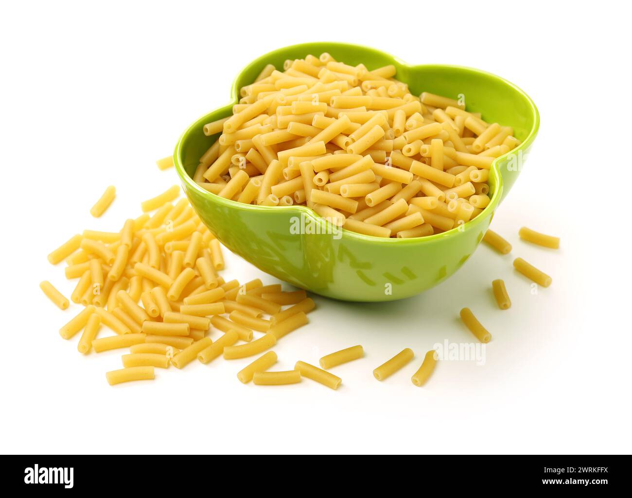 Italian pasta (Gomiti Rigati) on white background Stock Photo - Alamy