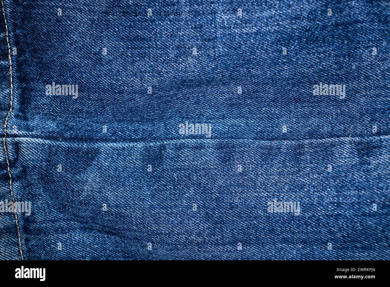 Blue jeans fabric background texture. Close up view, denim Stock Photo ...