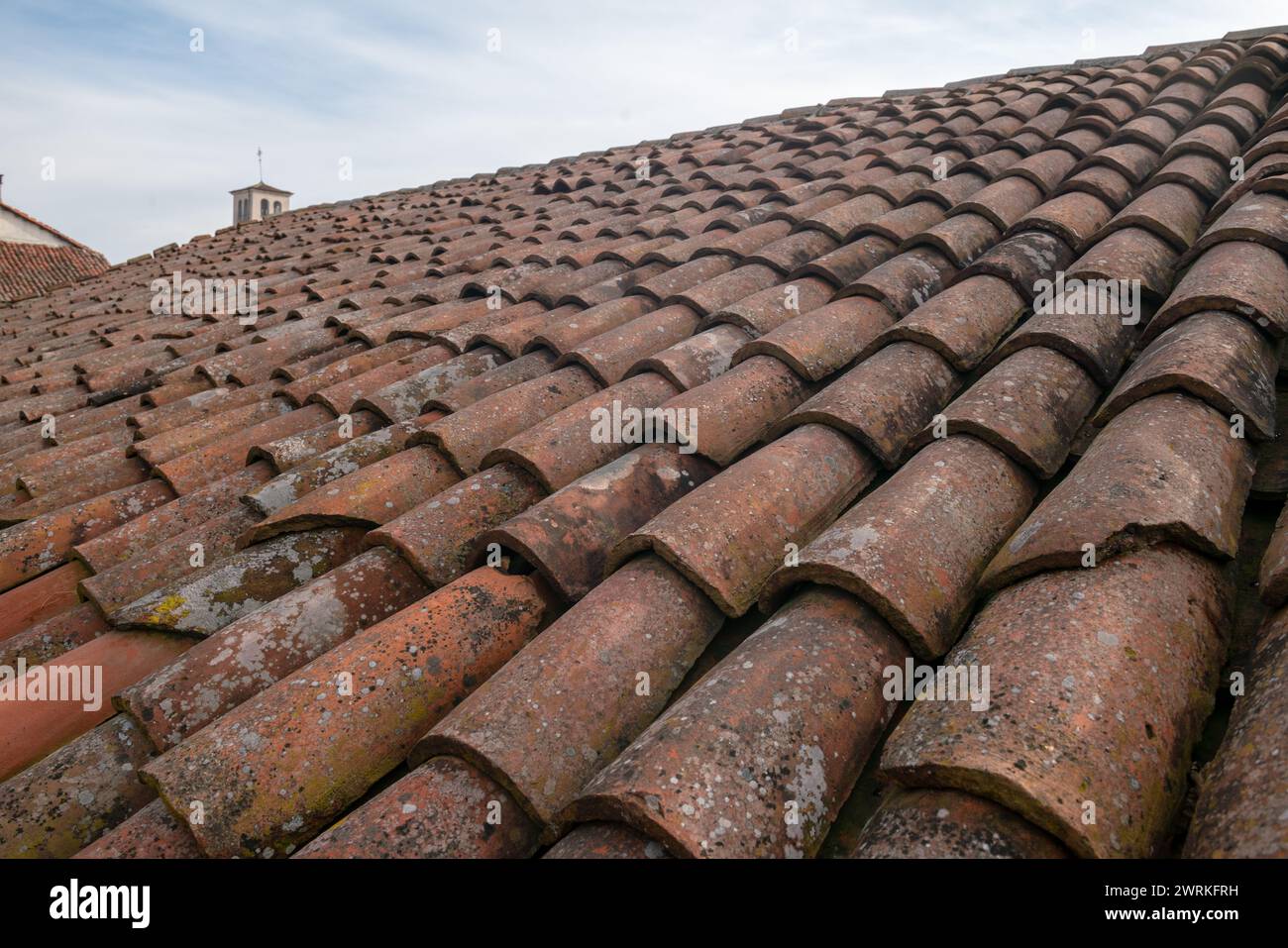 tiled roof supported on a double pitch roof, the old tiles tend to slip ...