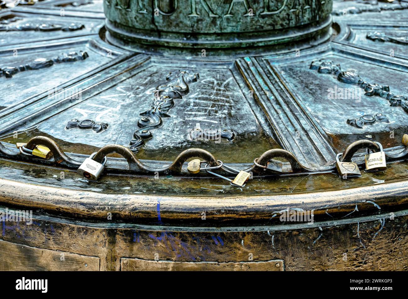 The base of ancient lamp post in Plaza Mayor, detail, in Madrid, Spain ...