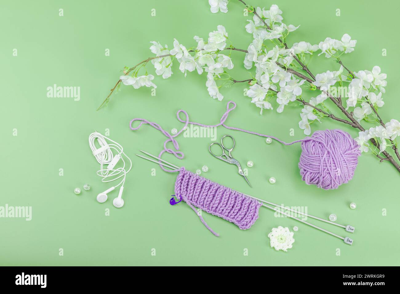Spring knitting concept. Pattern example, traditional tools, ball of ...