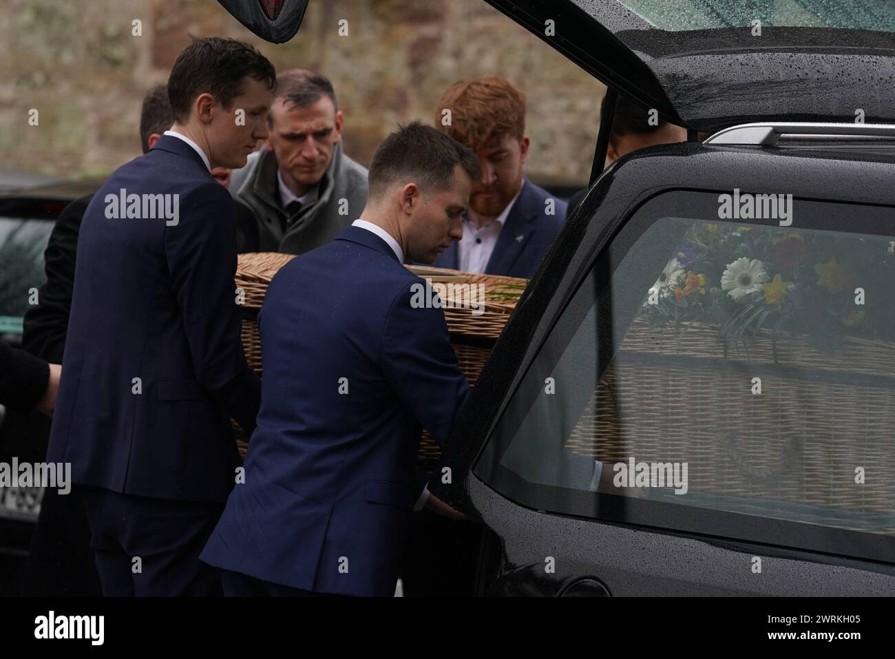 Pall bearers carry the casket from the hearse at the funeral of TV ...