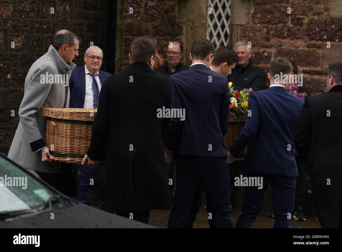 Pall bearers carry the casket at the funeral of TV presenter and ...