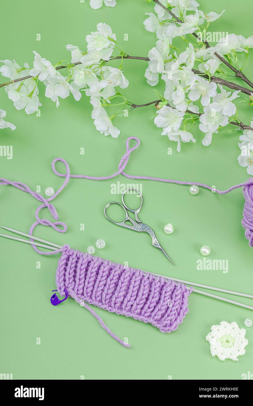 Spring knitting concept. Pattern example, traditional tools, ball of ...