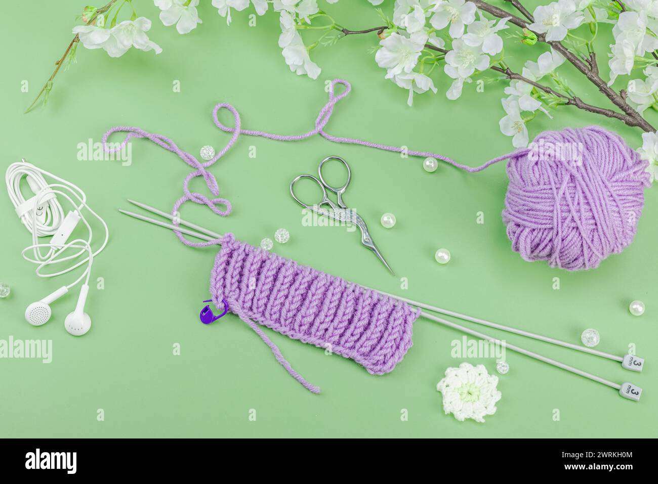 Spring knitting concept. Pattern example, traditional tools, ball of ...