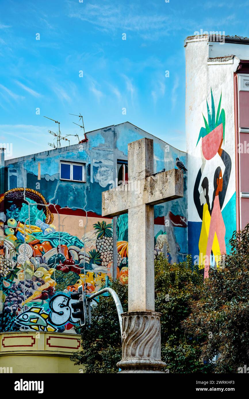 Christian religious cross and urban art graffiti in Madrid, Spain Stock ...
