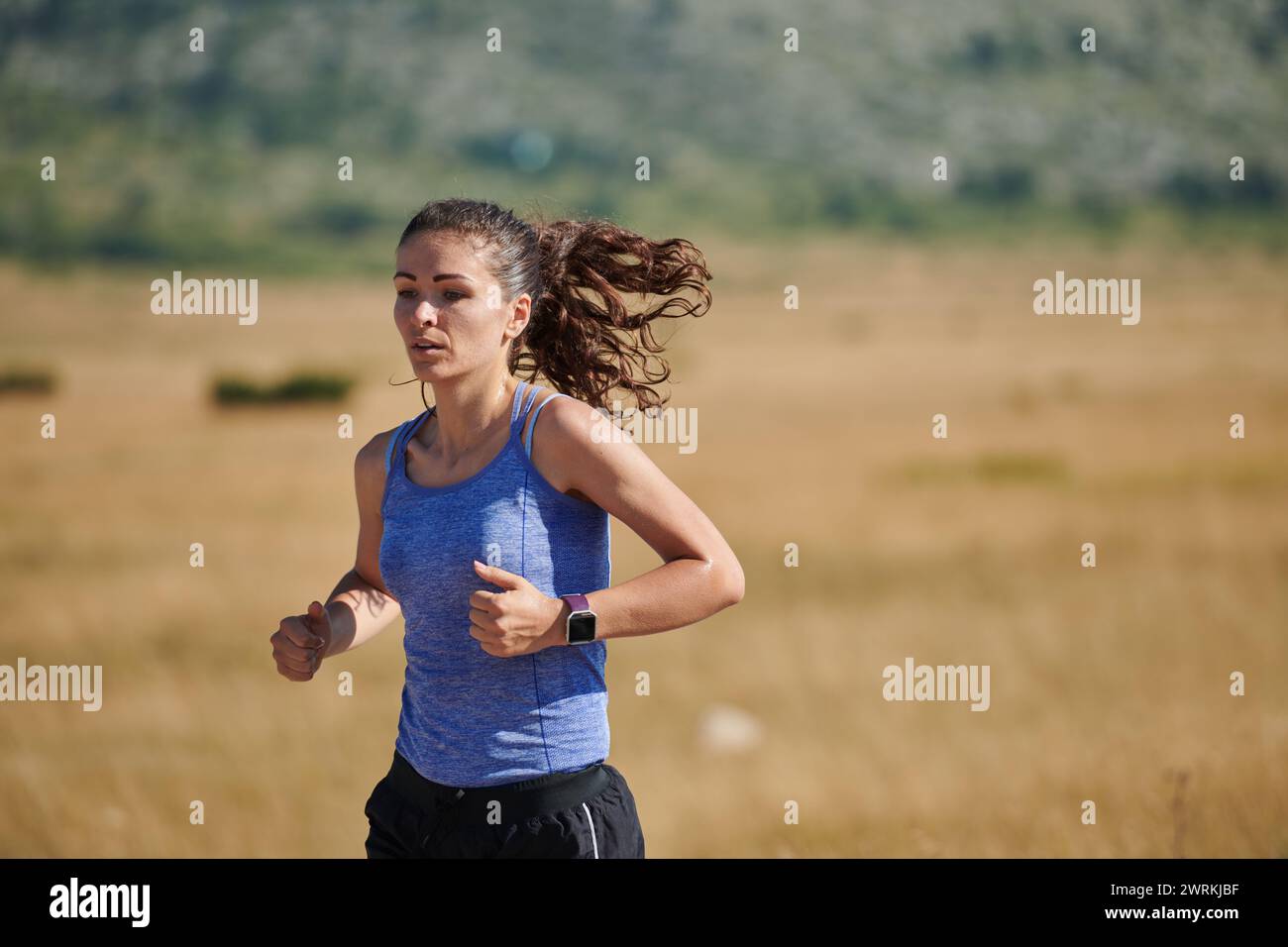 Solo Stride: Determined Athlete Woman Embarks on Fitness Journey for Marathon Preparation Stock ...