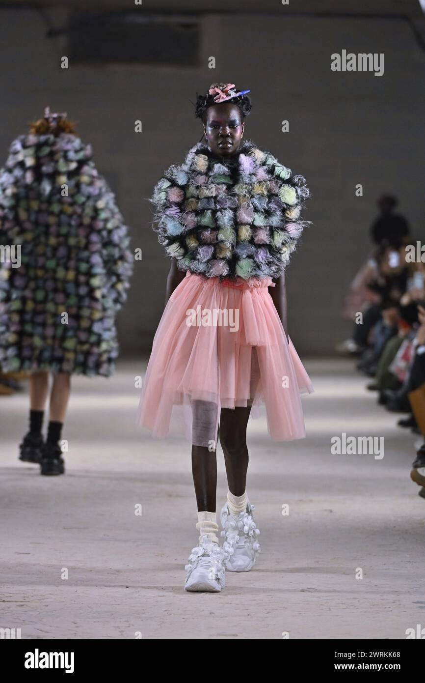 A model walks on the runway at the Noir fashion show during the Fall ...