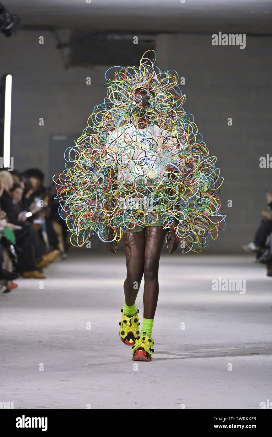 A model walks on the runway at the Noir fashion show during the Fall ...