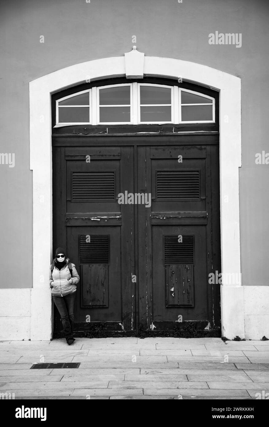 High contrast monochrome street photo emphasizing architectural texture ...