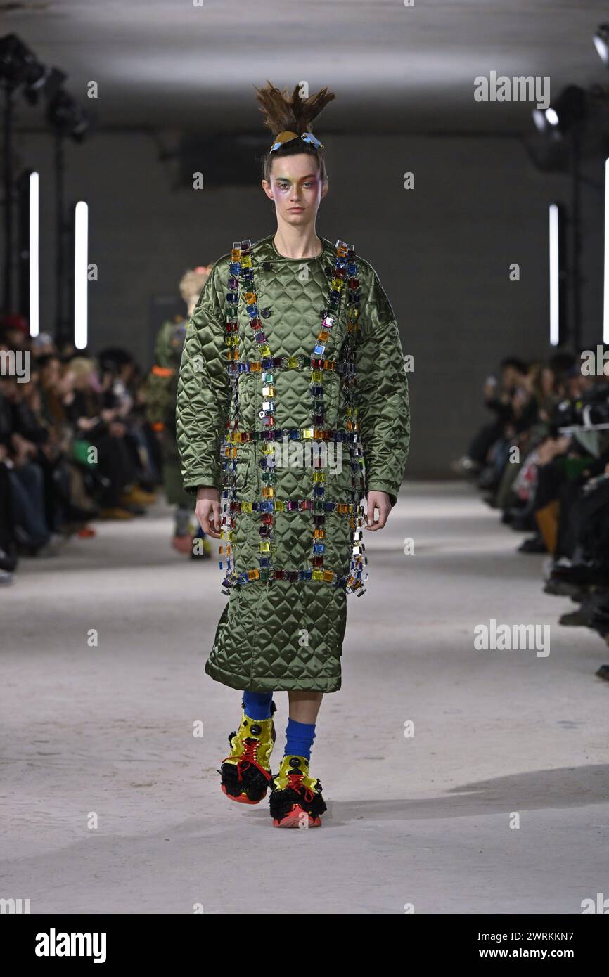 A model walks on the runway at the Noir fashion show during the Fall ...
