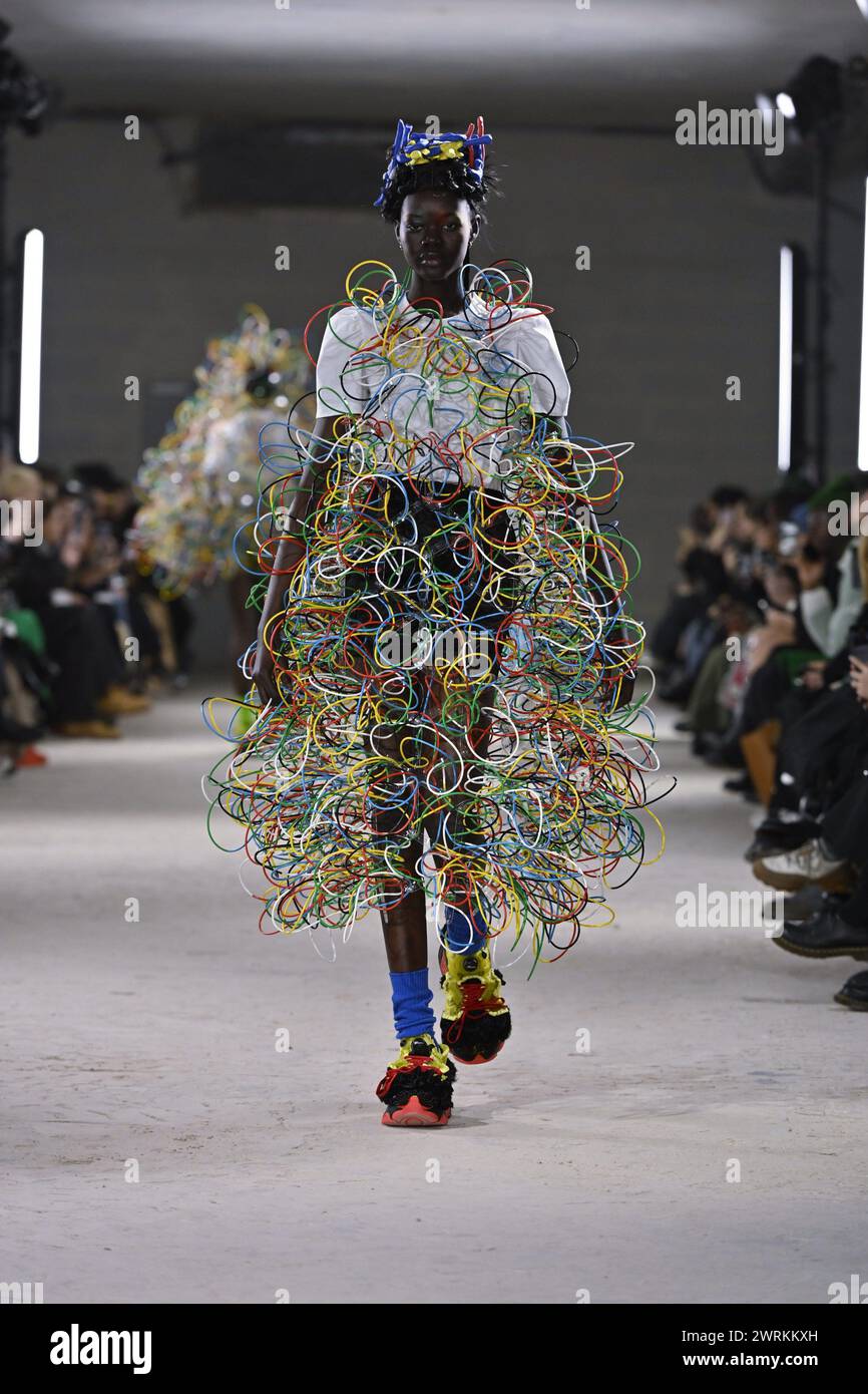 A model walks on the runway at the Noir fashion show during the Fall ...