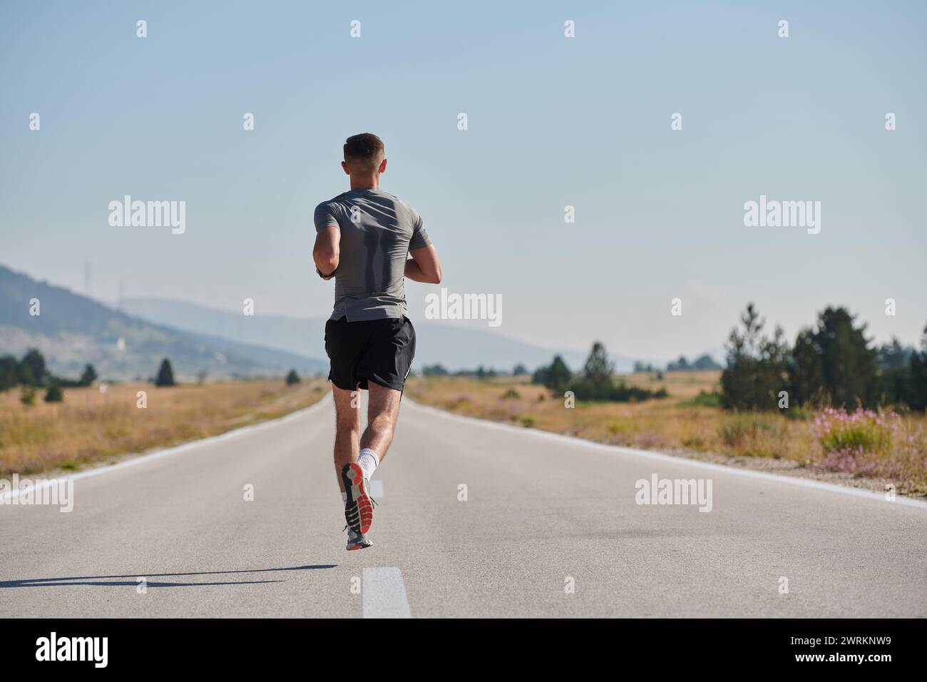 A dedicated marathon runner pushes himself to the limit in training ...