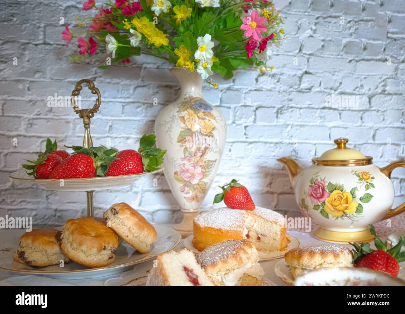 Vintage style afternoon tea strawberries and cream Victoria sponge ...