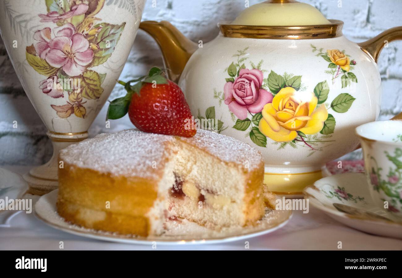 Vintage style afternoon tea strawberries and cream Victoria sponge ...