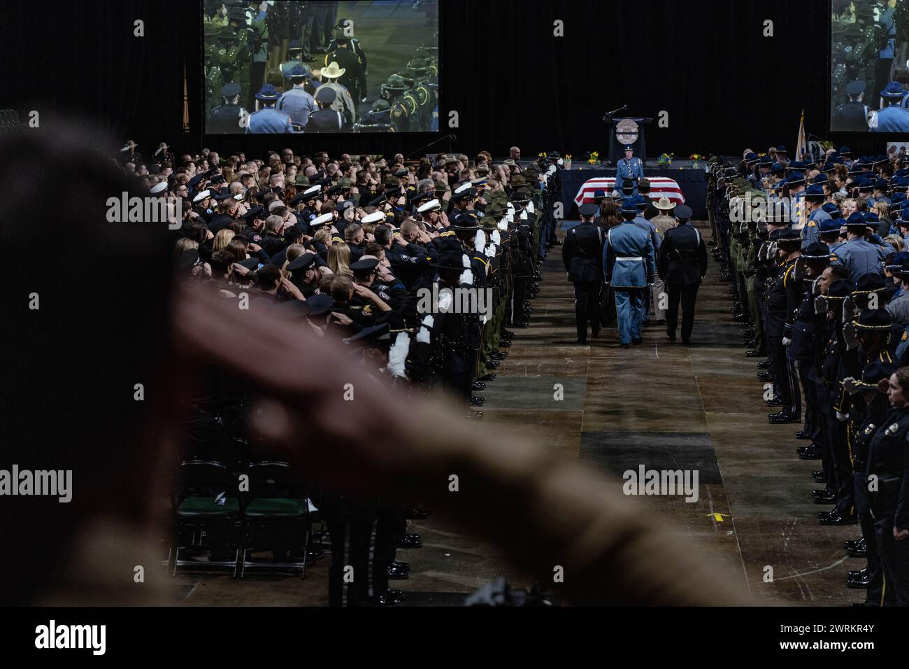 Washington State Patrol troopers solemnly perform a ceremony honoring ...