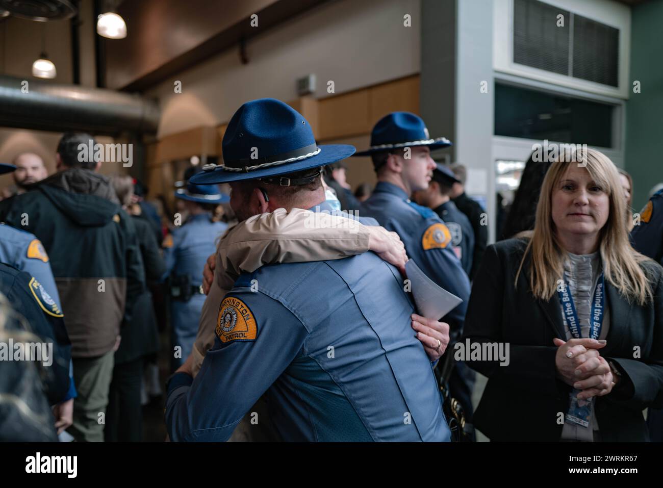Fellow troopers attend the memorial ceremony of Washington State Patrol ...