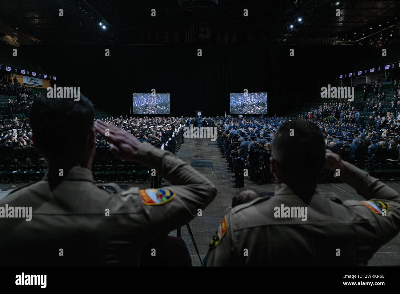 Washington State Patrol troopers solemnly perform a ceremony honoring ...