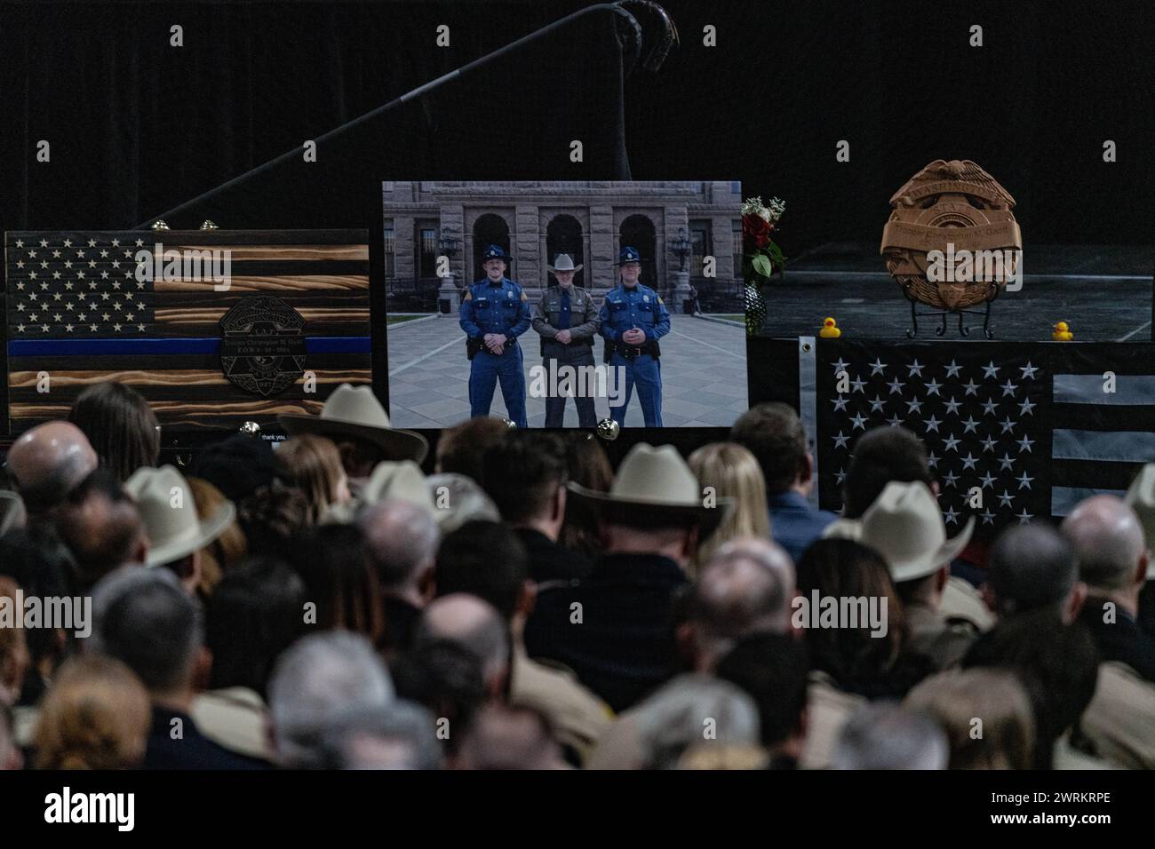 Washington State Patrol troopers solemnly perform a ceremony honoring ...