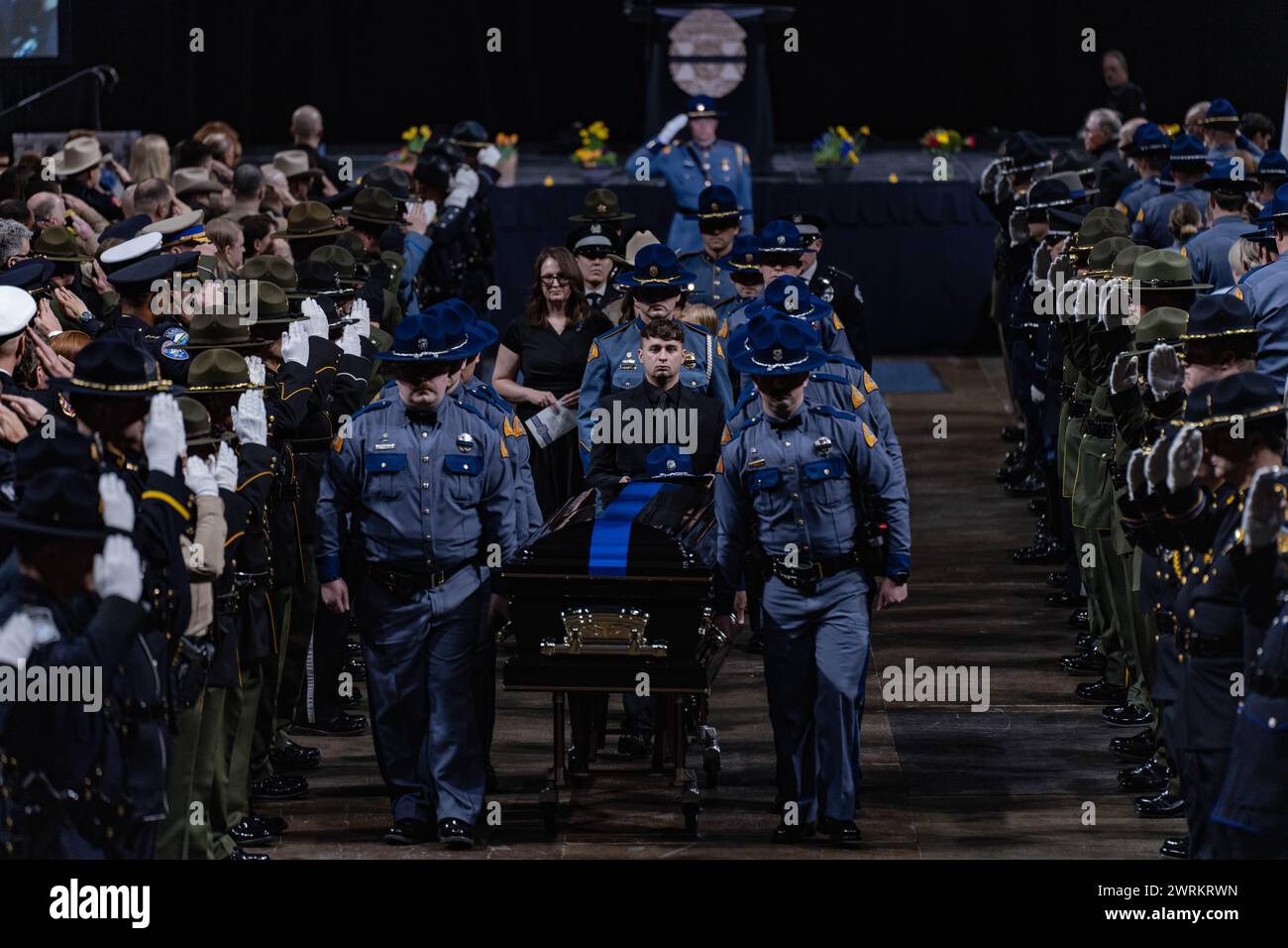 Washington State Patrol troopers solemnly perform a ceremony honoring ...