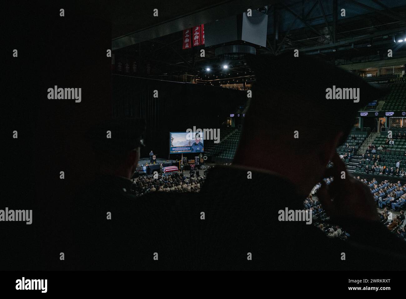Washington State Patrol troopers solemnly perform a ceremony honoring ...