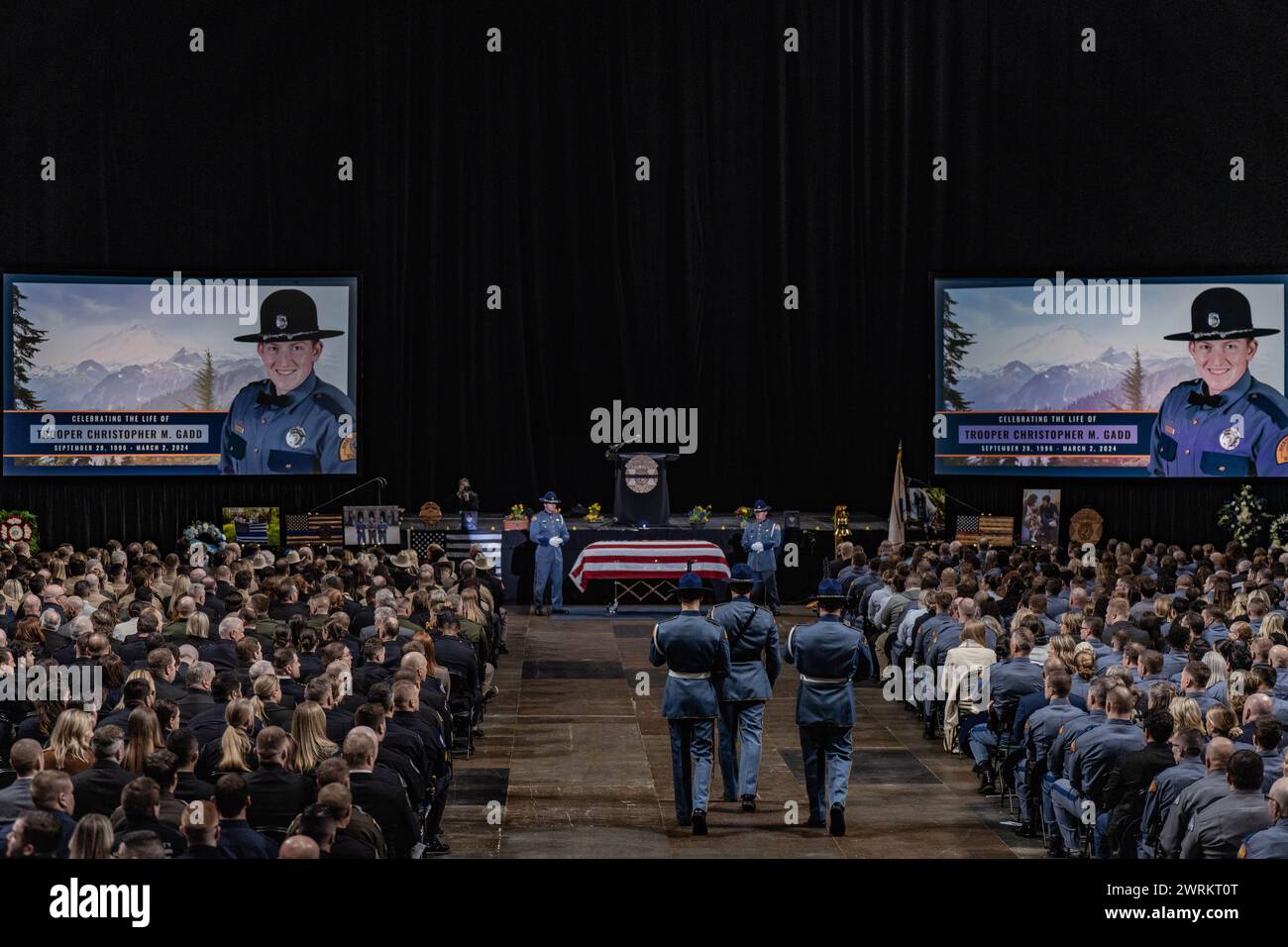 Washington State Patrol troopers solemnly perform a ceremony honoring ...