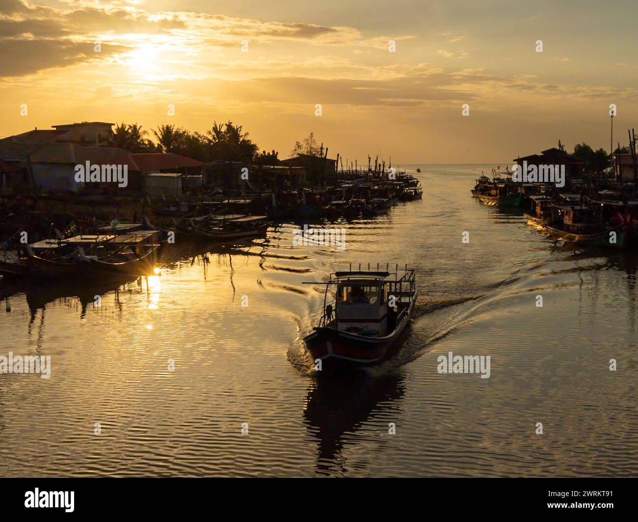 Fishing boat back from the sea Stock Photo - Alamy