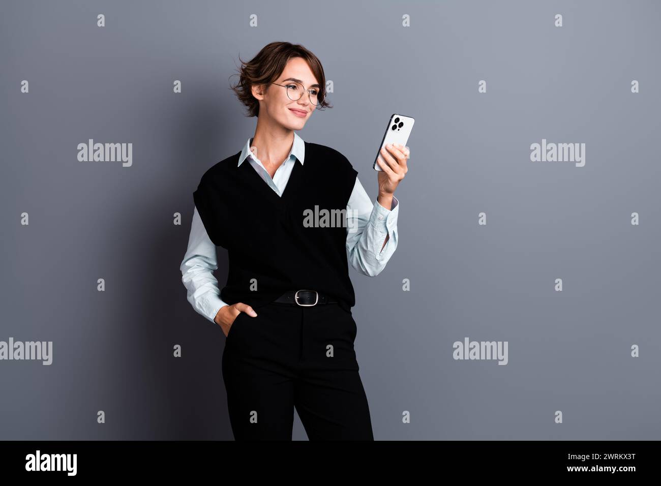 Photo of stunning nice lady dressed stylish clothes reading email ...