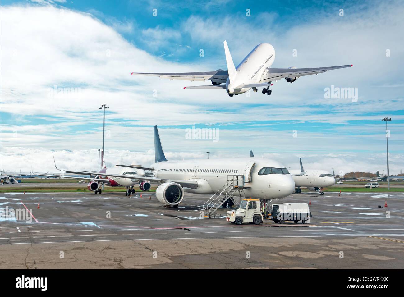 Jet passenger aircraft is waiting airport. Blue clouds sky summer air ...