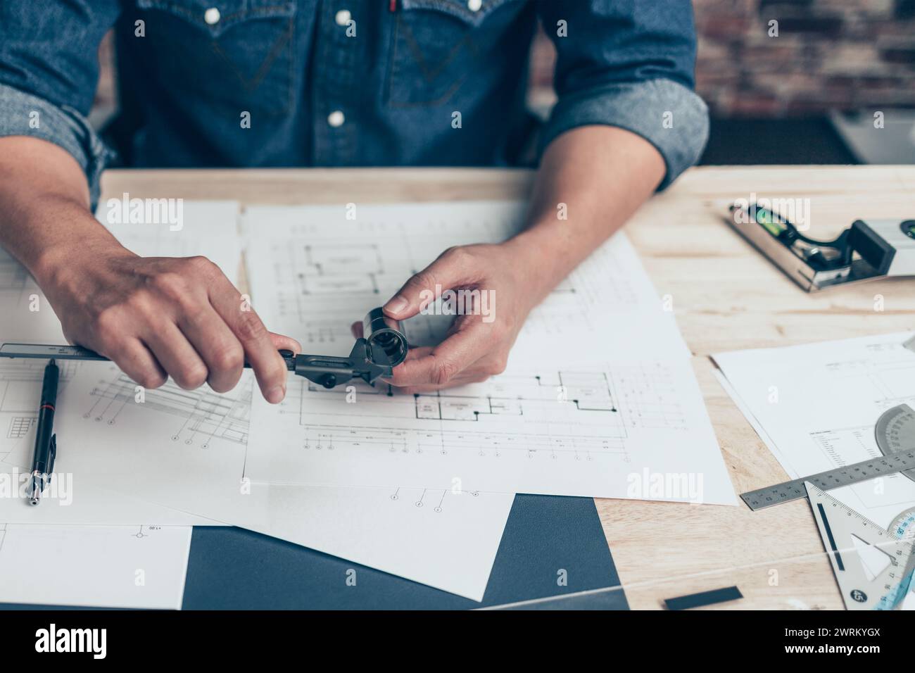 Architecture hands hold vernier caliper working and checking joint pipe ...