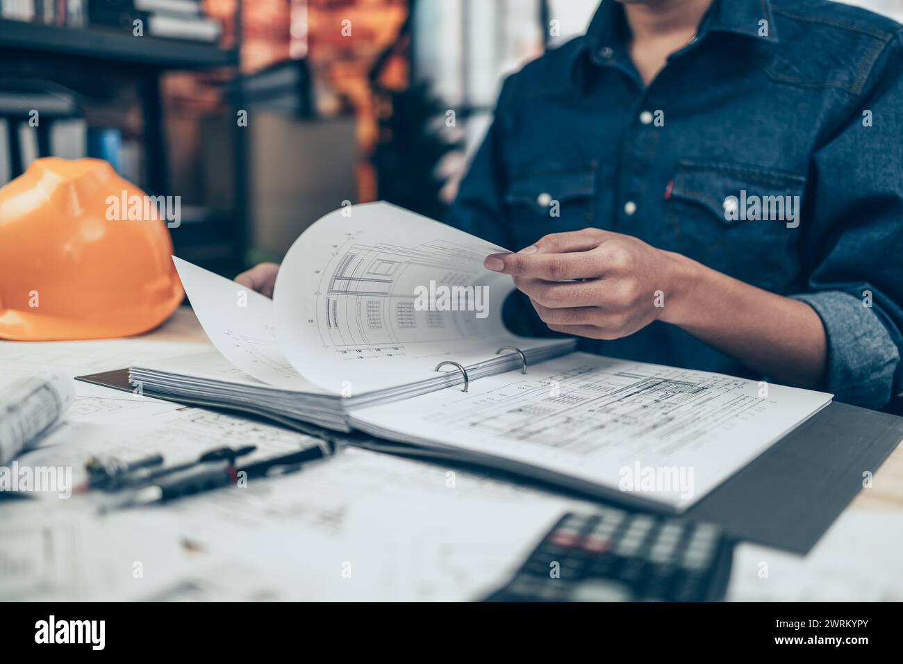 Architect engineer read drawing design working on blueprint. House ...