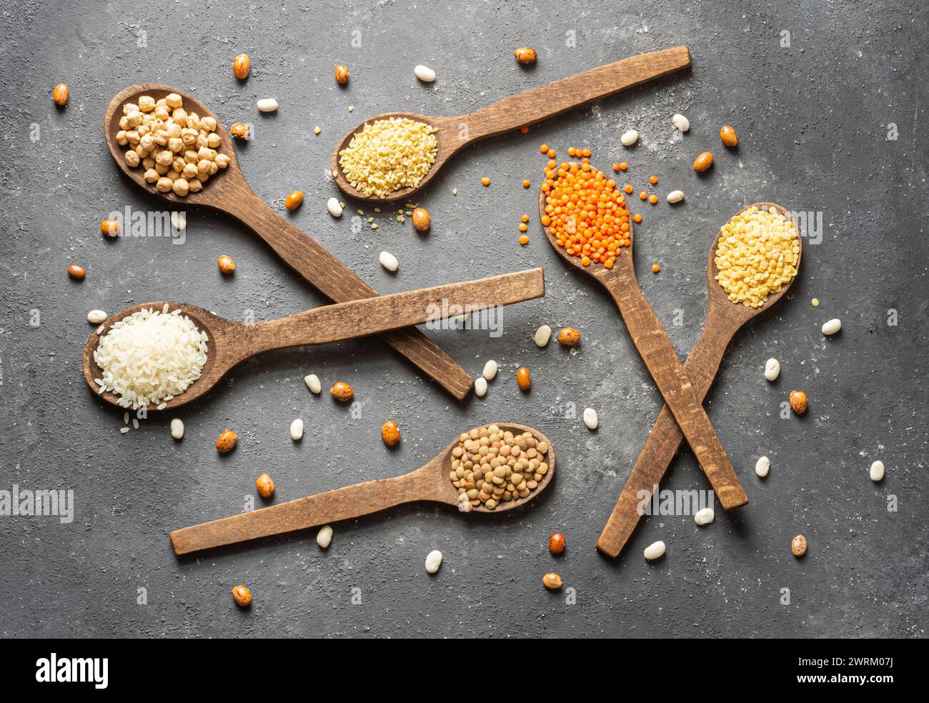 Different type of raw dry legumes composition. White beans, lentils ...
