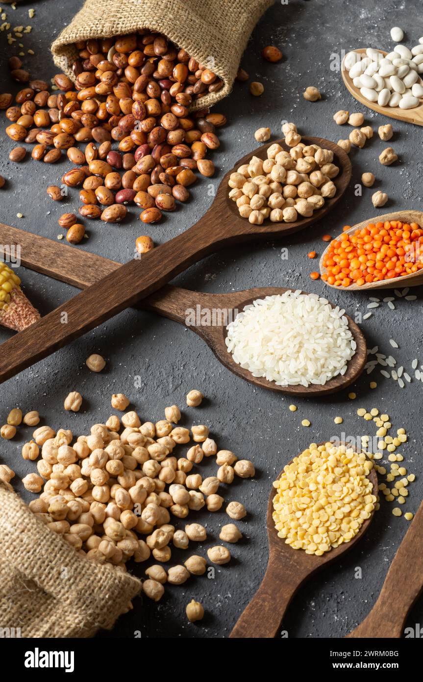 Different type of raw dry legumes composition. White beans, lentils ...