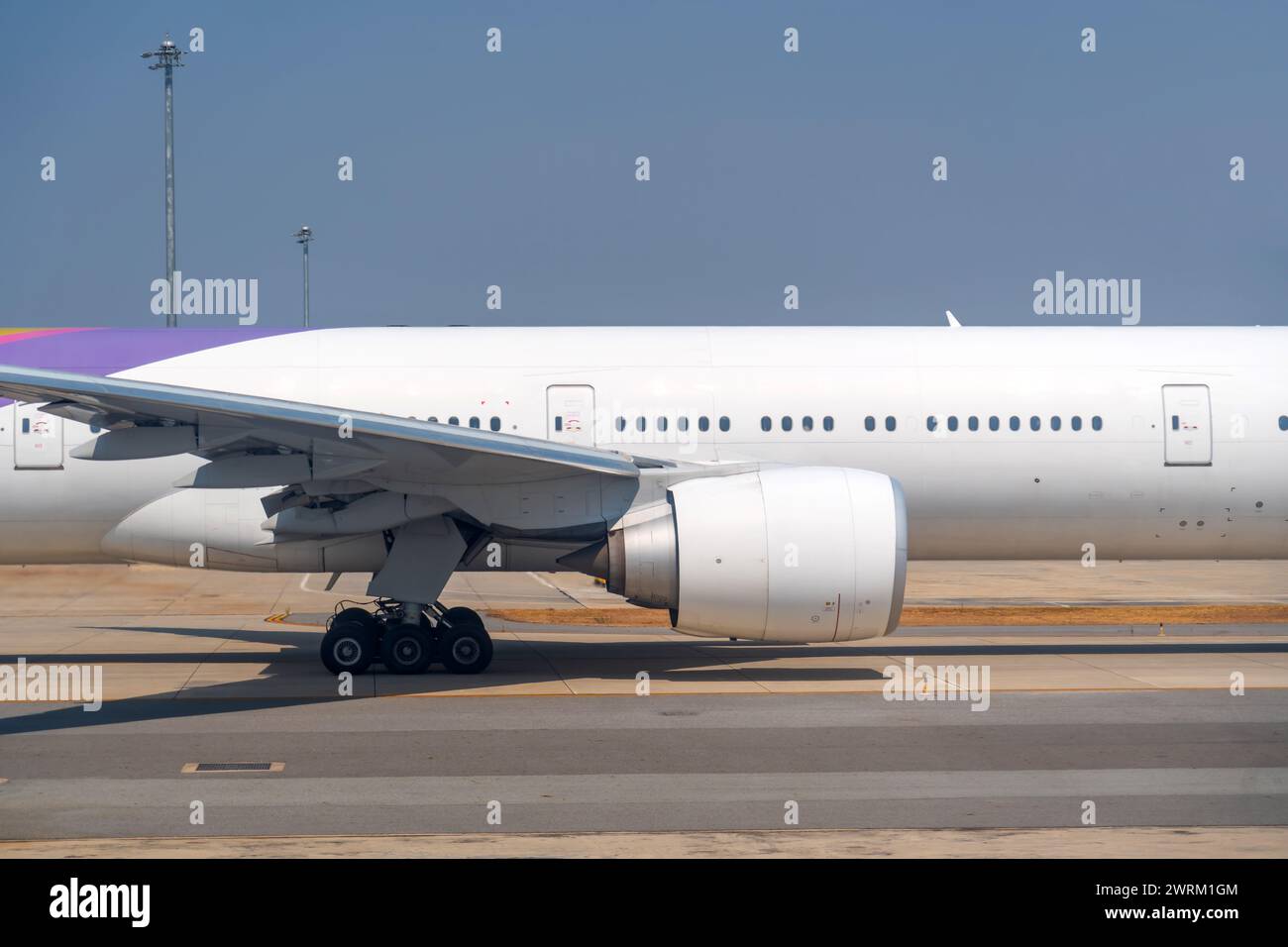 View of the fuselage of the aircraft and many windows, wing landing ...