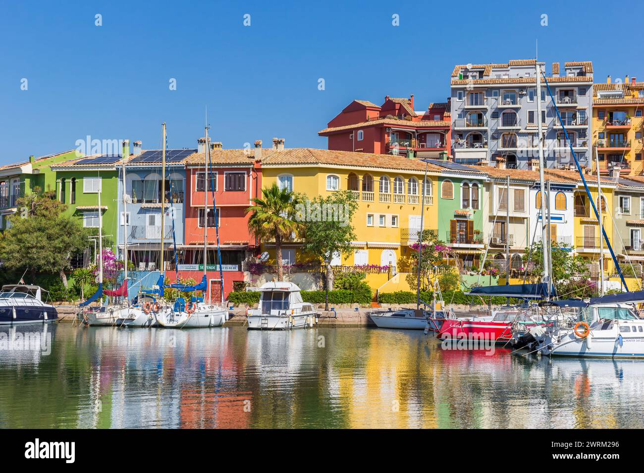 Sailing yachts in front of colorful houses in Valencia, Spain Stock ...